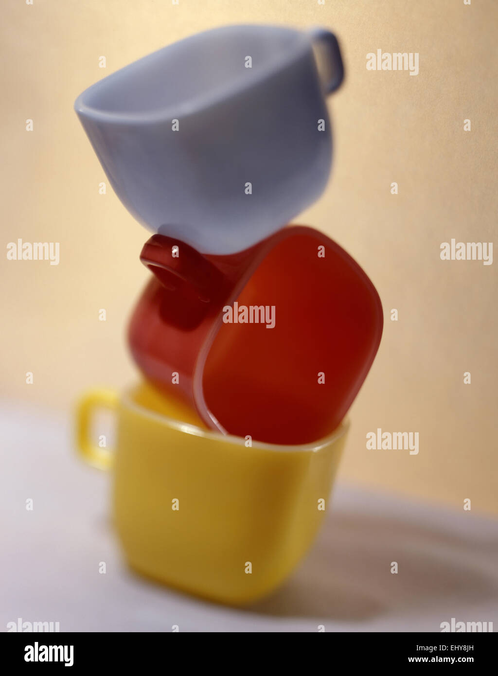 Stack of square vintage coffee cups Stock Photo - Alamy