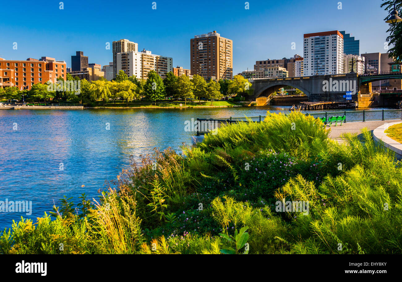 The Charles River at North Point Park and view of Boston skyline in ...