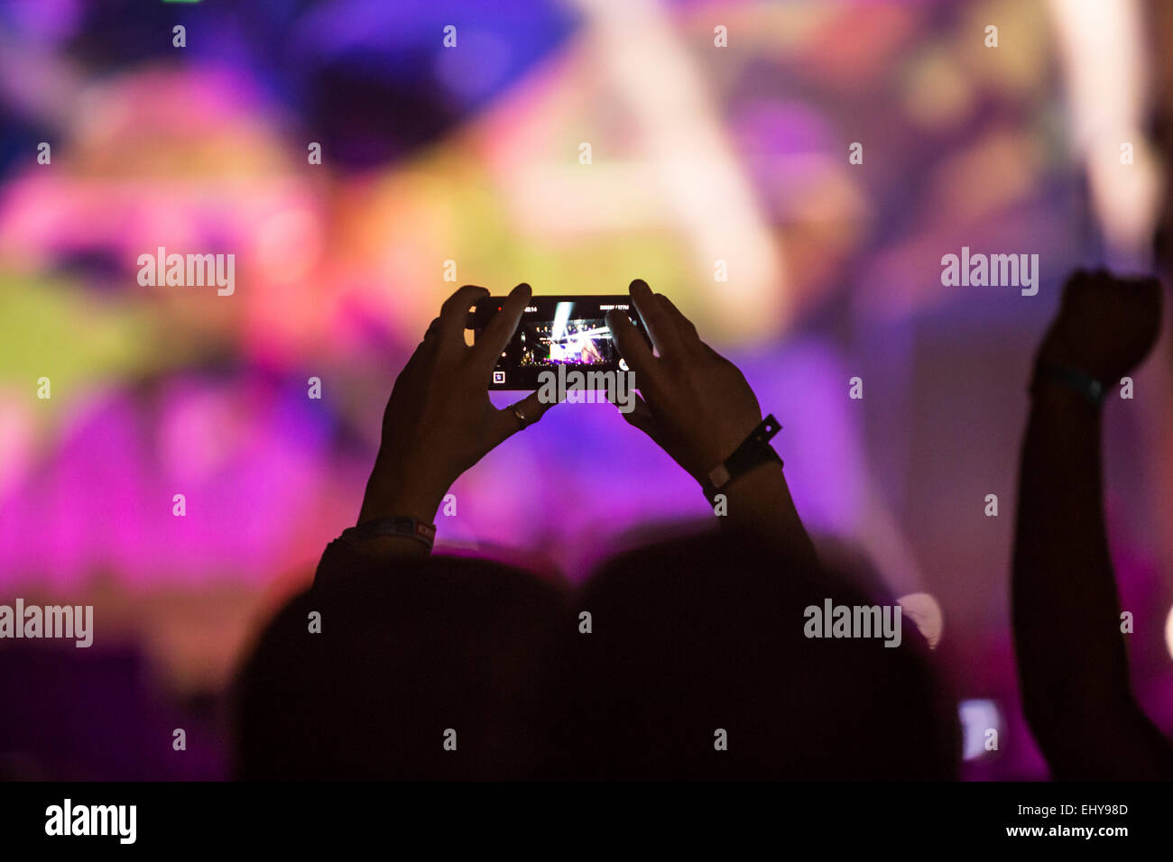 Young people having fun at music concert Stock Photo - Alamy