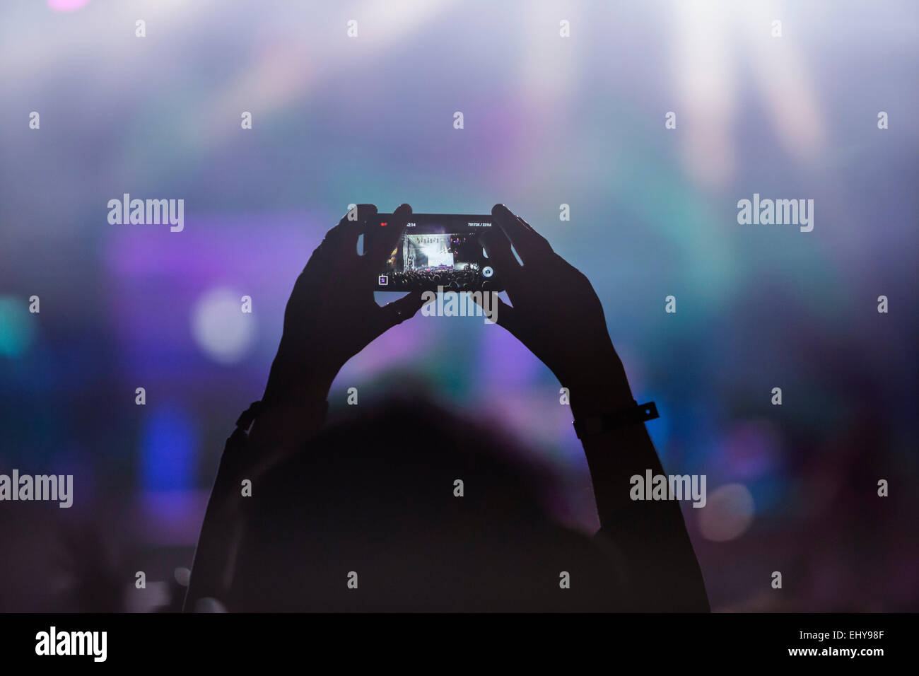 Young people having fun at music concert Stock Photo - Alamy