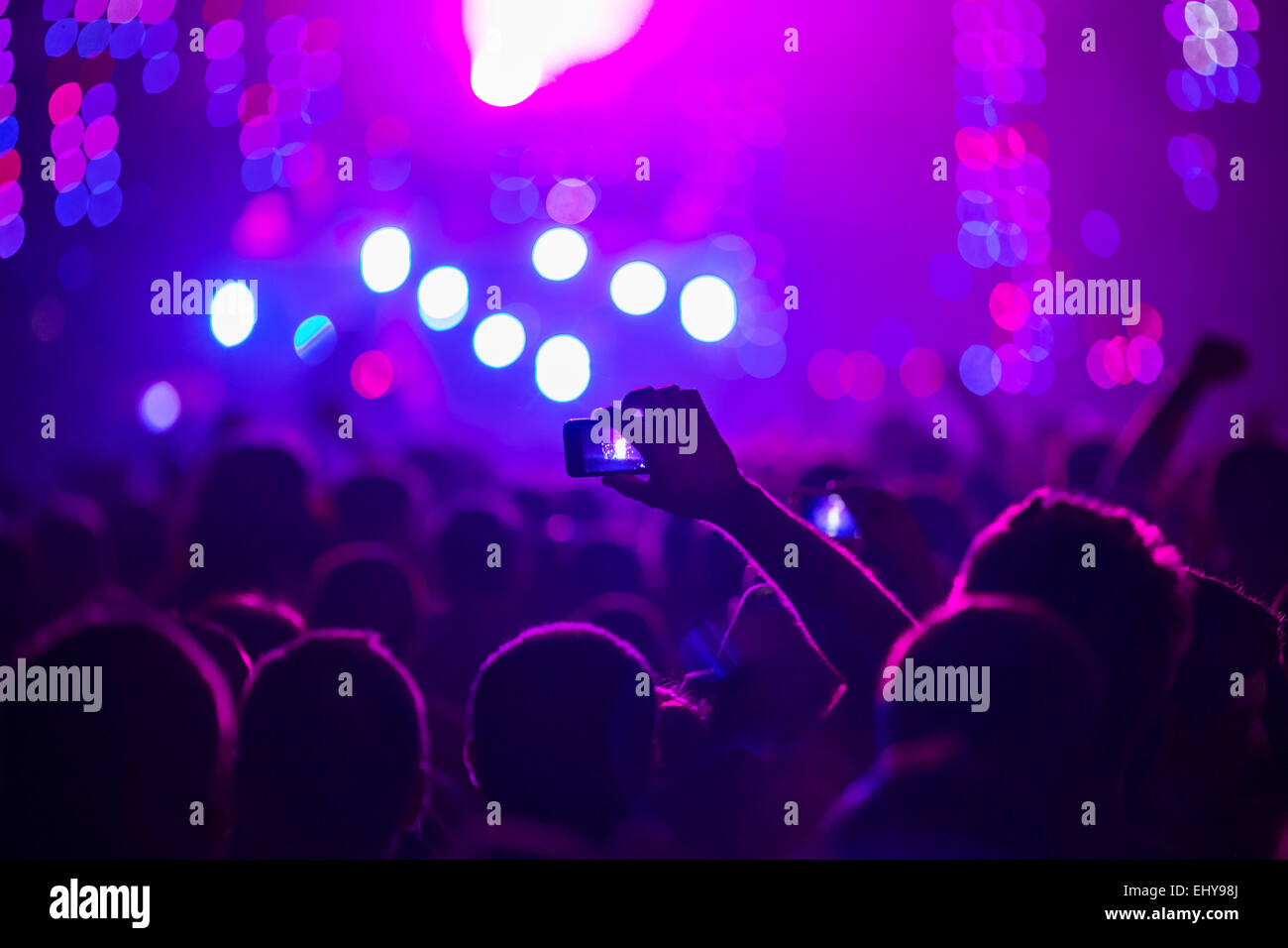 Young people having fun at music concert Stock Photo - Alamy