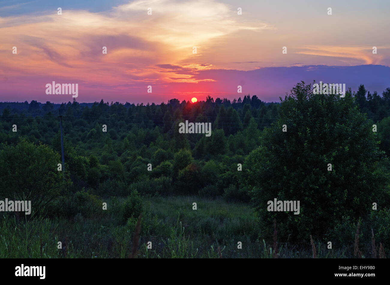 Sunset rural landscape Stock Photo - Alamy