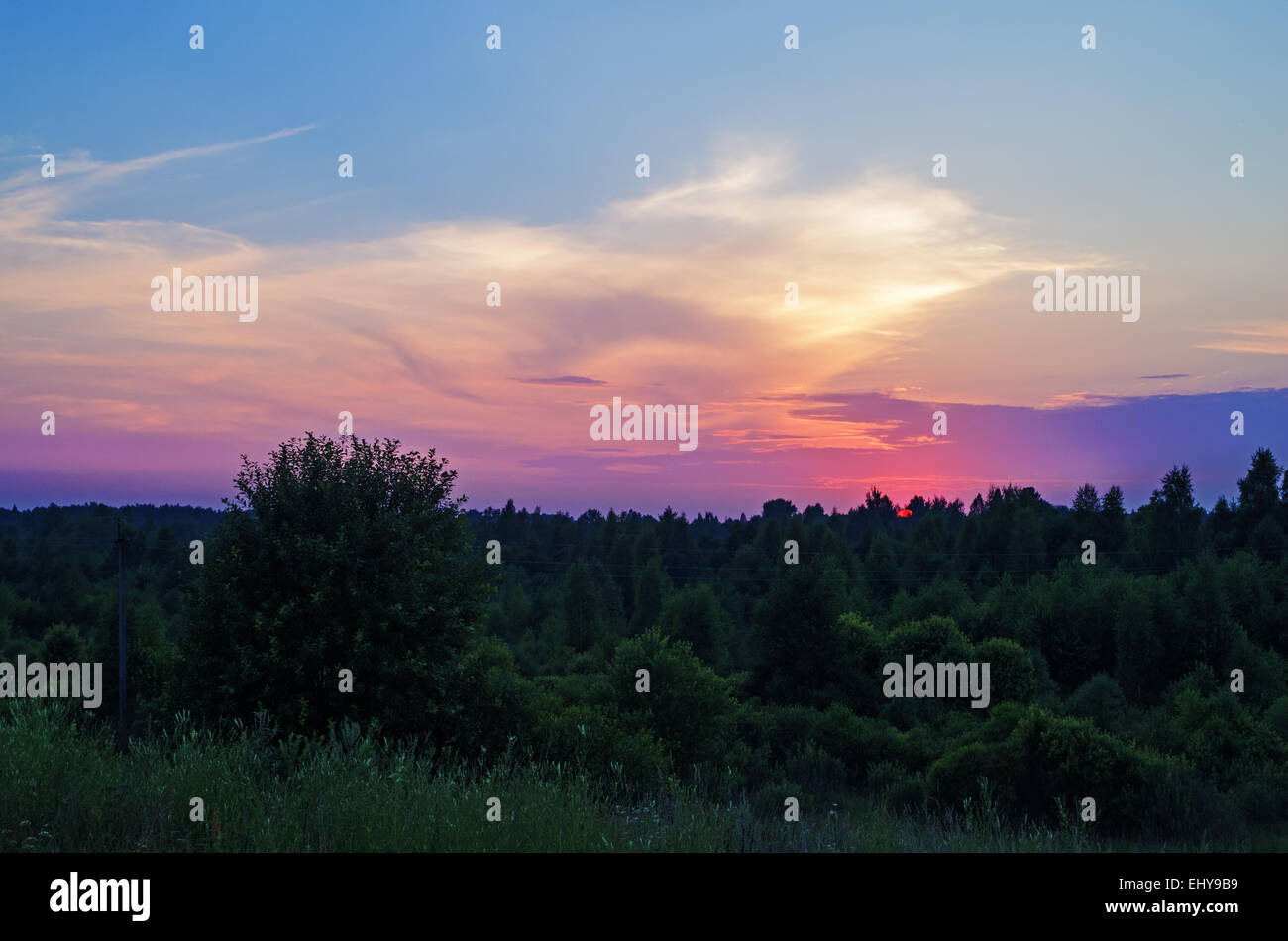 Sunset rural landscape Stock Photo - Alamy