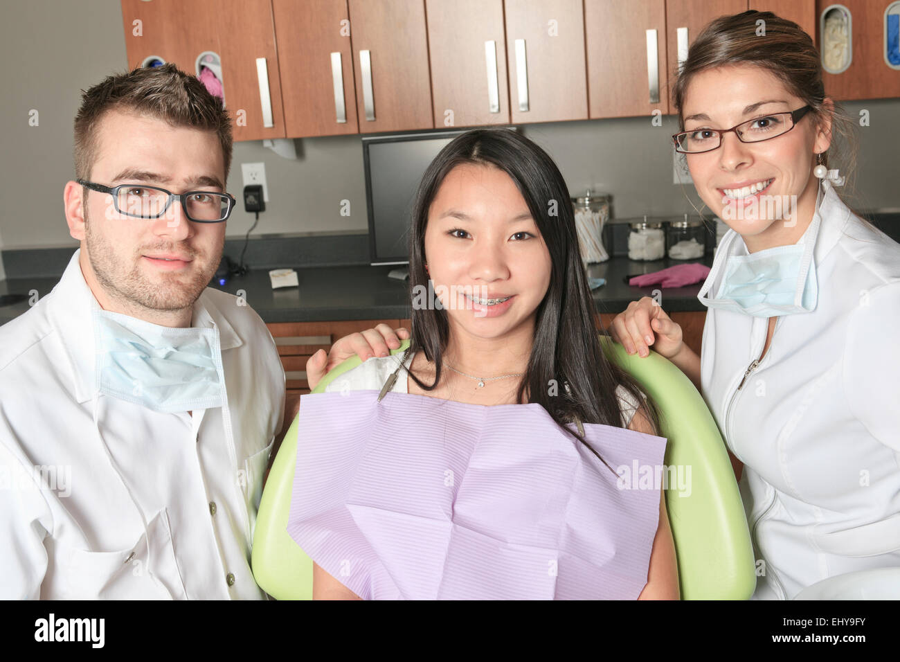 dental office with employee and client Stock Photo - Alamy