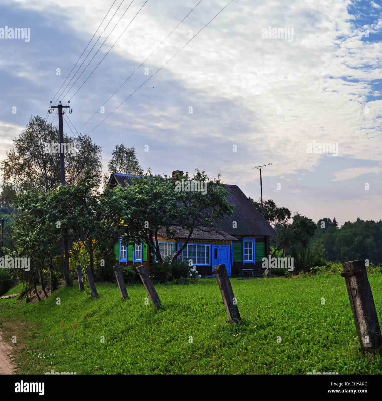 Rural landscape. Village house and garden Stock Photo - Alamy