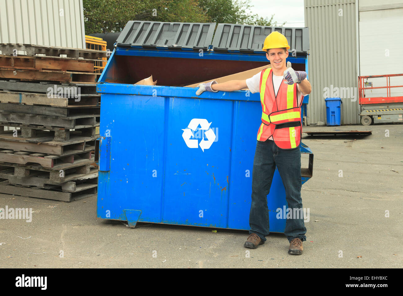 A worker who recycling thing on recycle center Stock Photo - Alamy