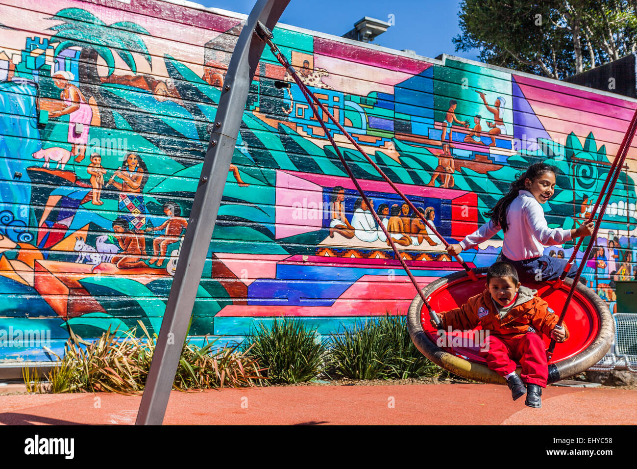 Mexican children playing in a play park, The Mission District, San ...