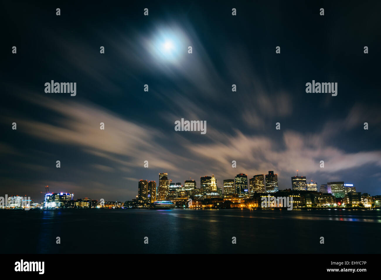 The moon and clouds moving through the sky over the Boston skyline at ...
