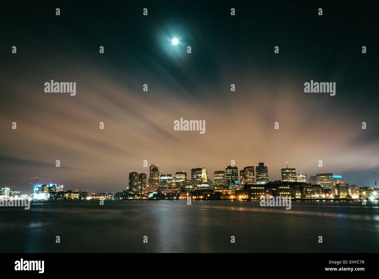 The moon and clouds moving through the sky over the Boston skyline at ...