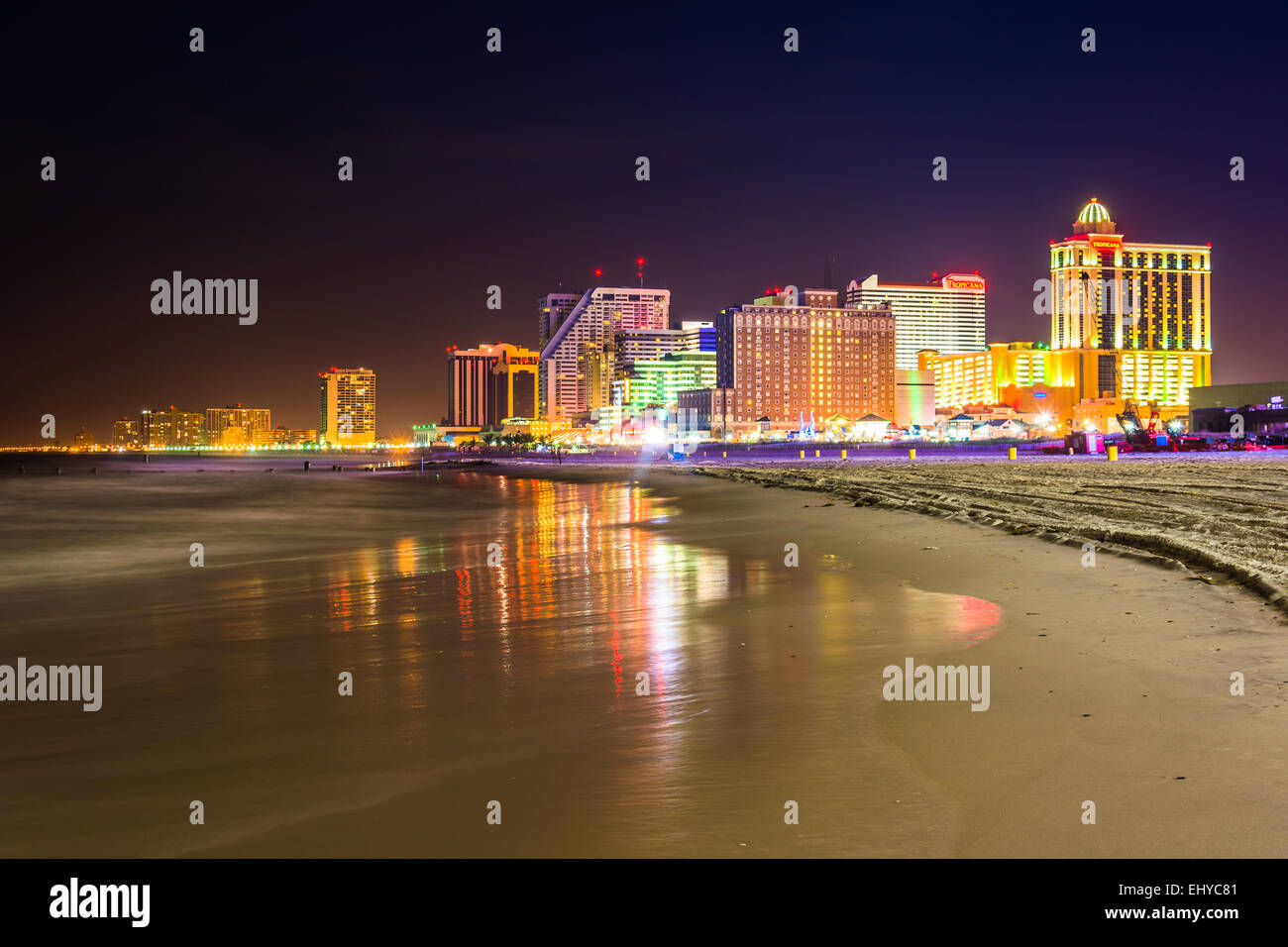 The skyline and Atlantic Ocean at night in Atlantic City, New Jersey ...