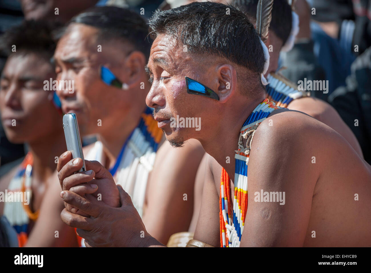 Naga tribe's Man with mobile phone Stock Photo - Alamy