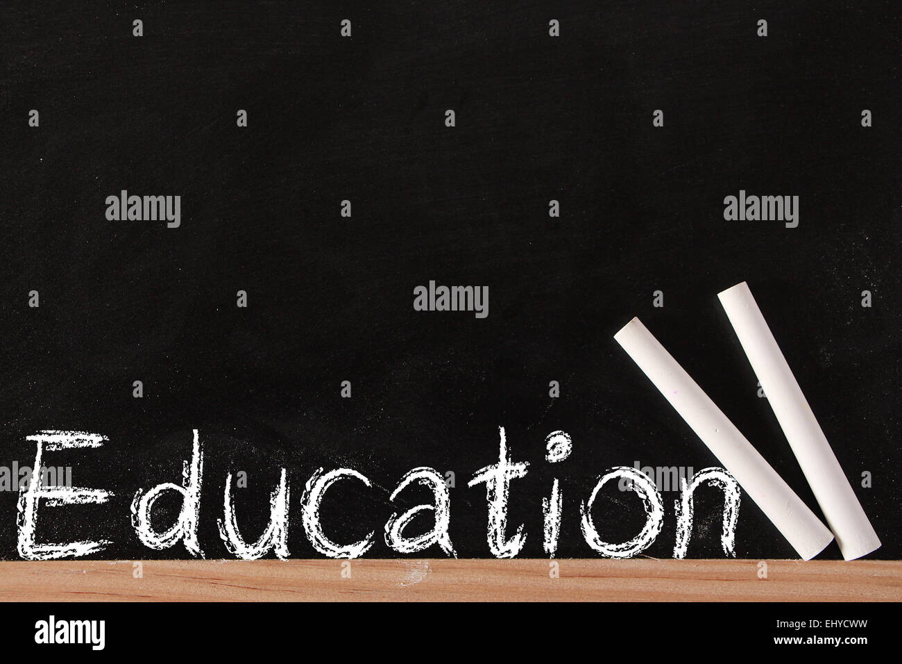 Education text is written on chalkboard which can be education ...