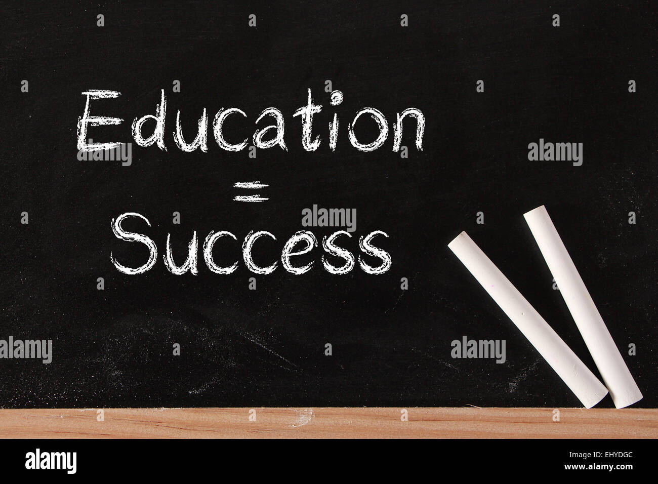 Education is success concept on blackboard with two white chalks Stock ...