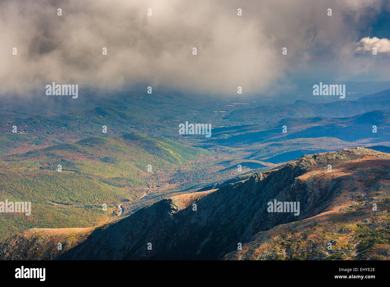 View of low clouds over distant mountains from Mount Washington, New ...