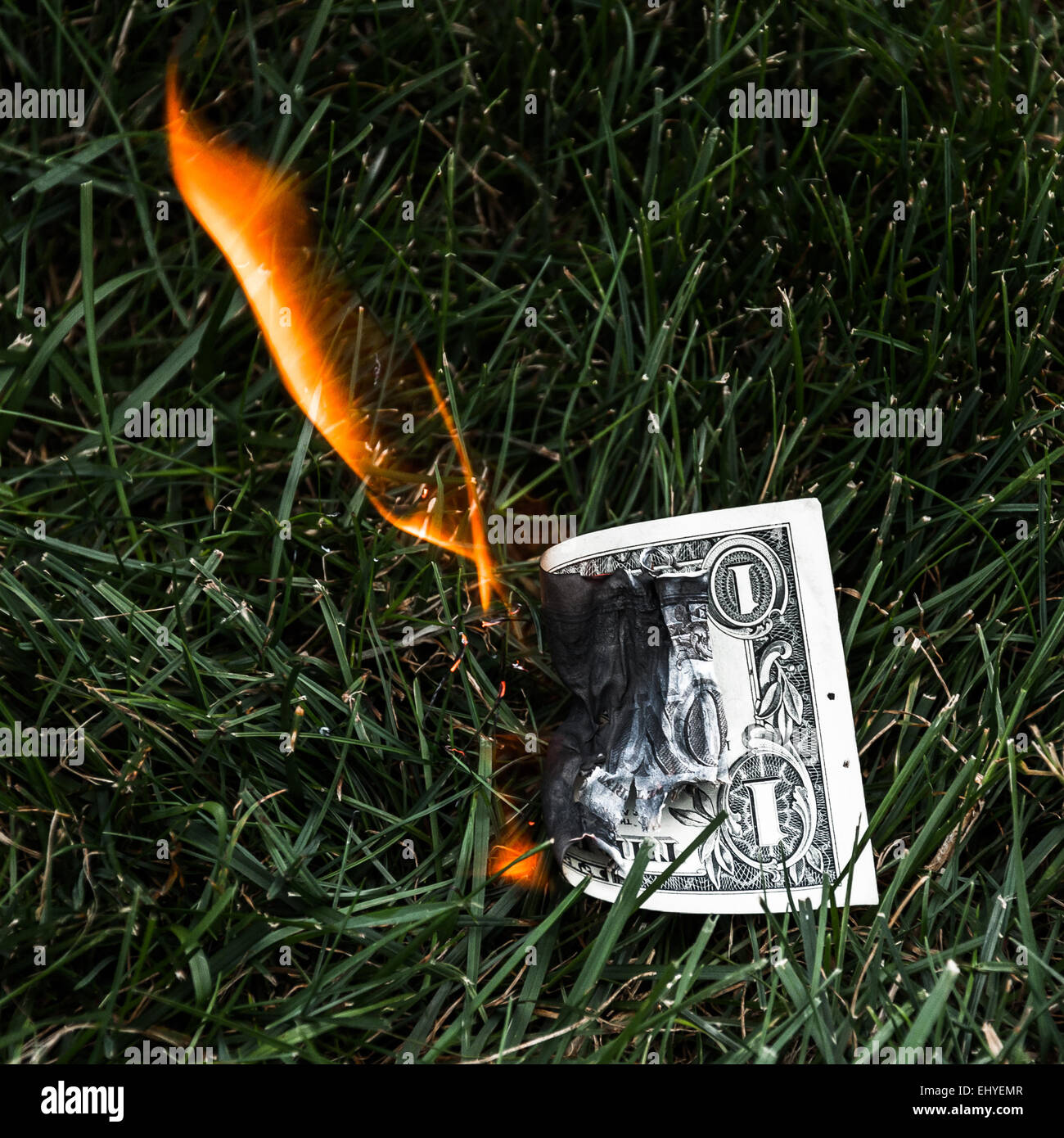 Burning dollar bill hi-res stock photography and images - Alamy