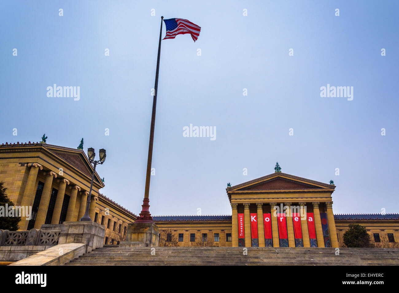 American flag and the exterior of the Art Museum in Philadelphia ...