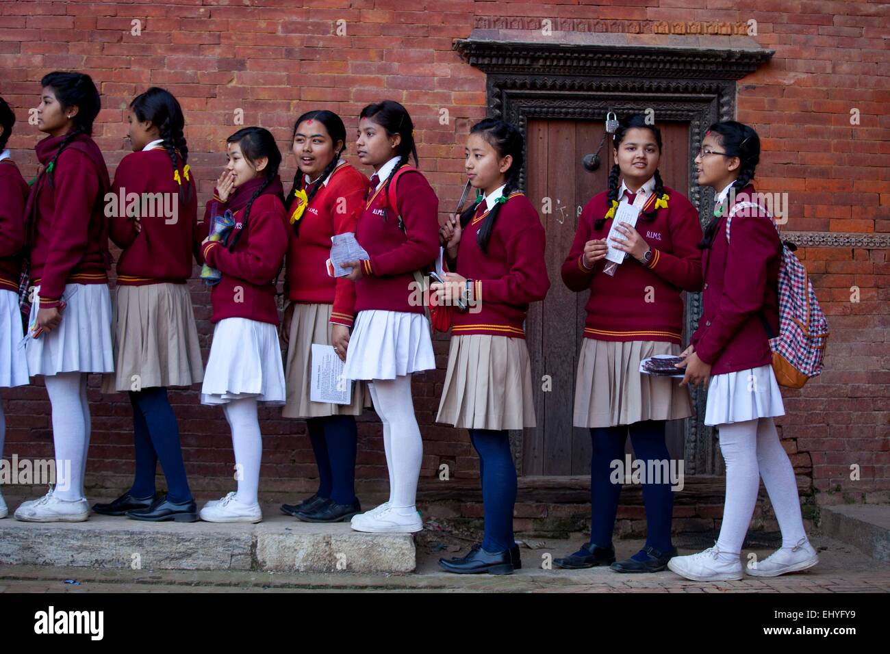 Kathmandu, Nepal. 19th Mar, 2015. Students wait to attend the School ...