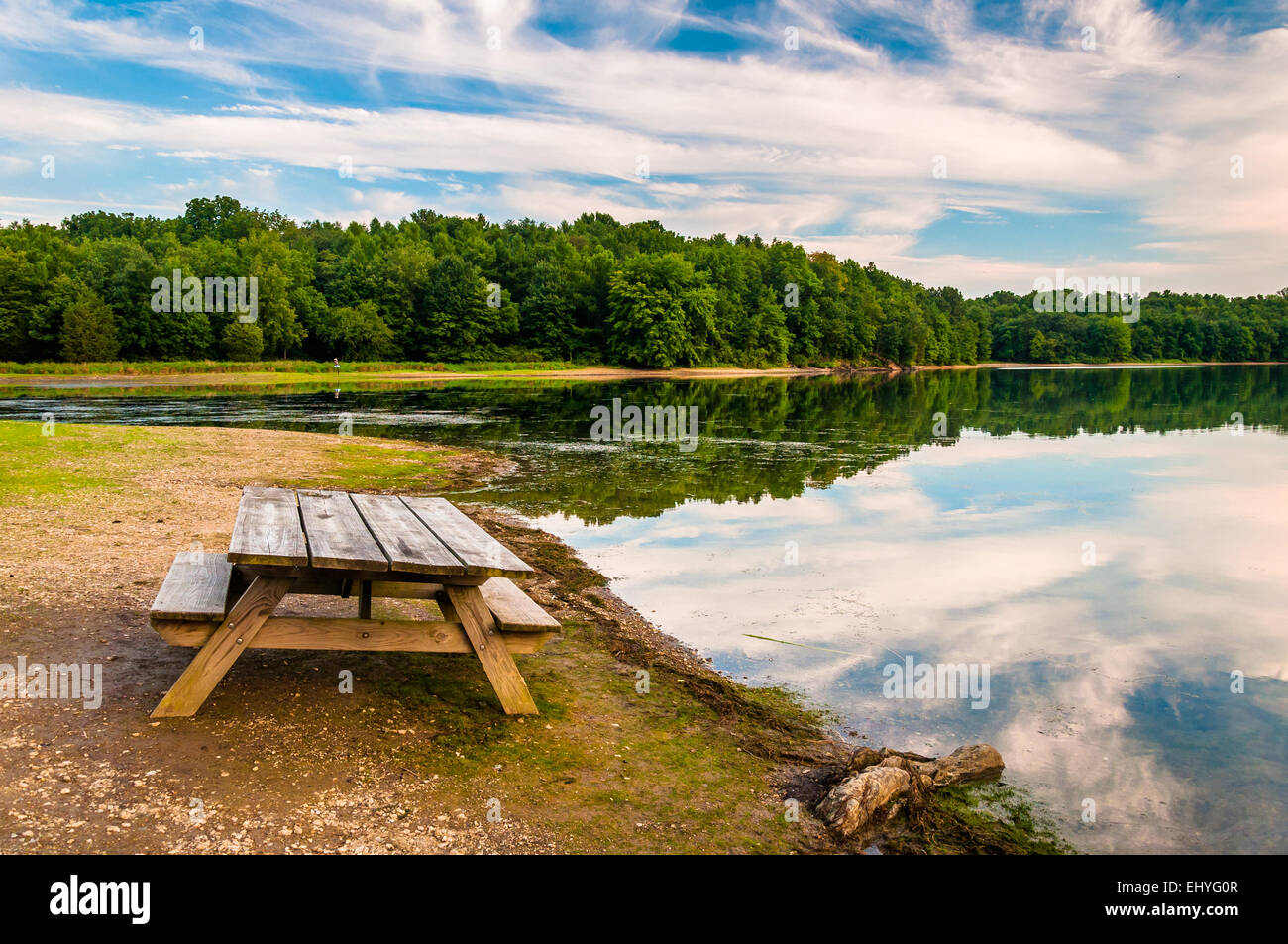 Bench on the shore of Lake Marburg, at Codorus State Park, Pennsylvania ...