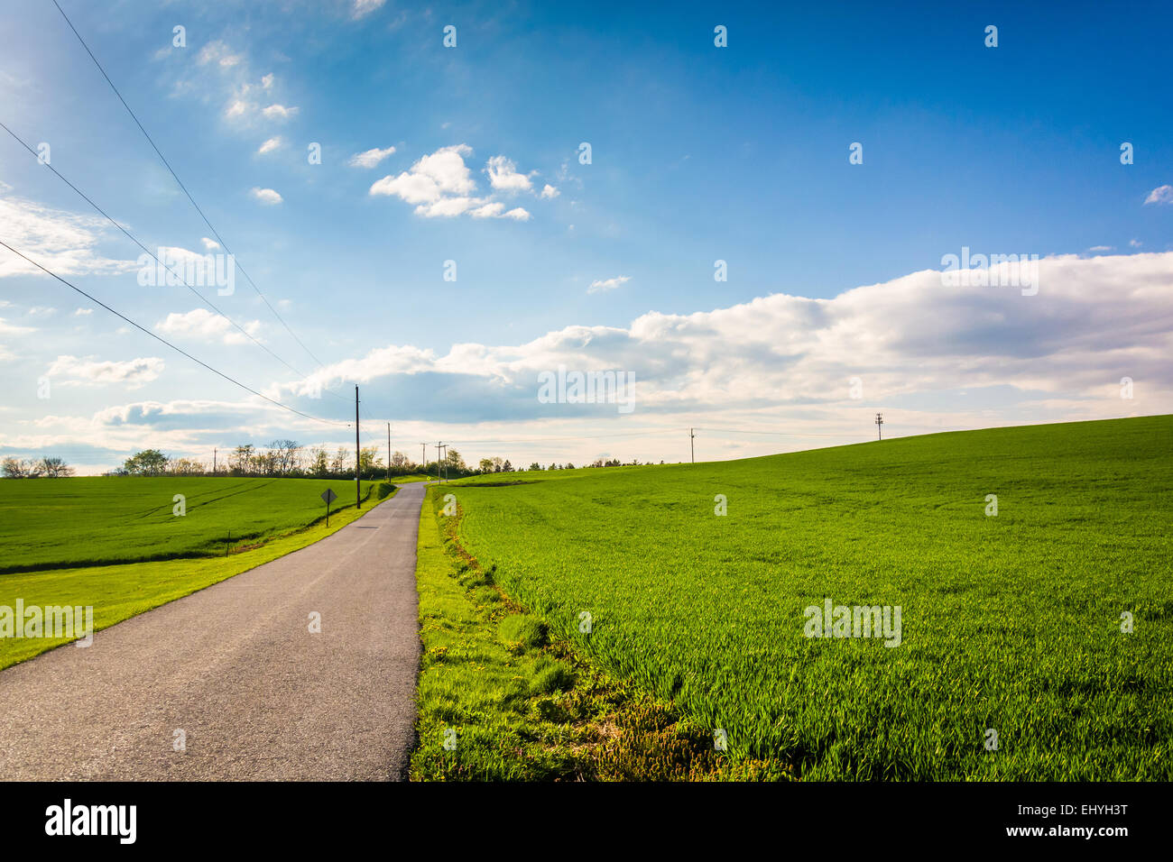 Country road through farm fields in rural York County, Pennsylvania ...