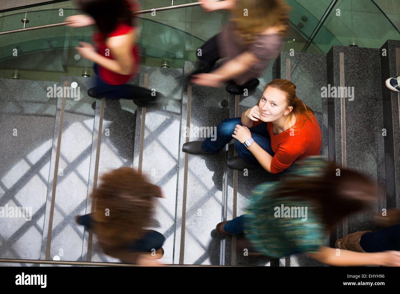 At the university/college - Students rushing up and down a busy ...