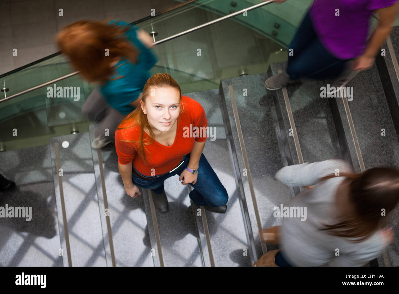 At the university/college - Students rushing up and down a busy ...