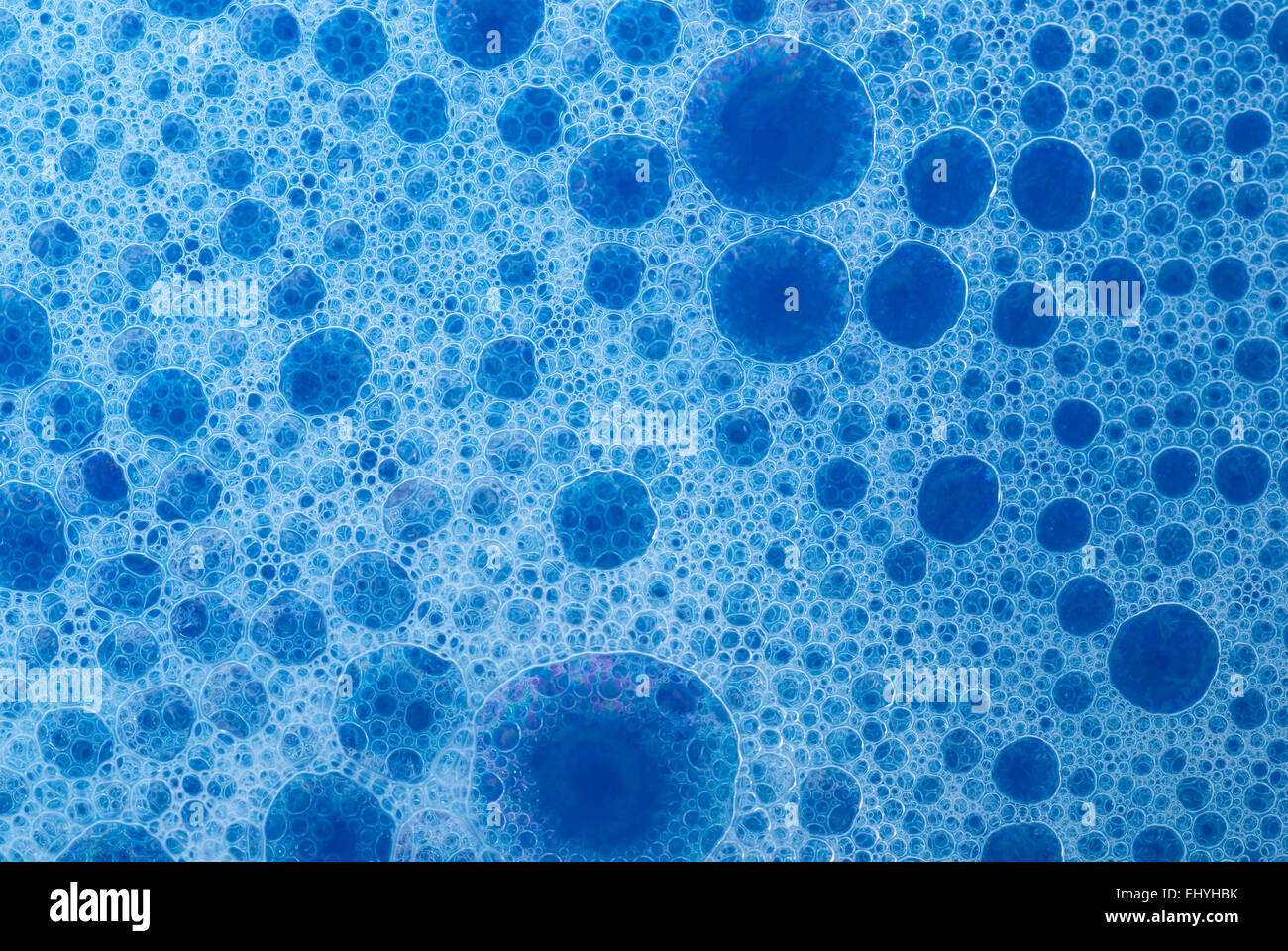 Blue foam bubbles texture close up background Stock Photo - Alamy