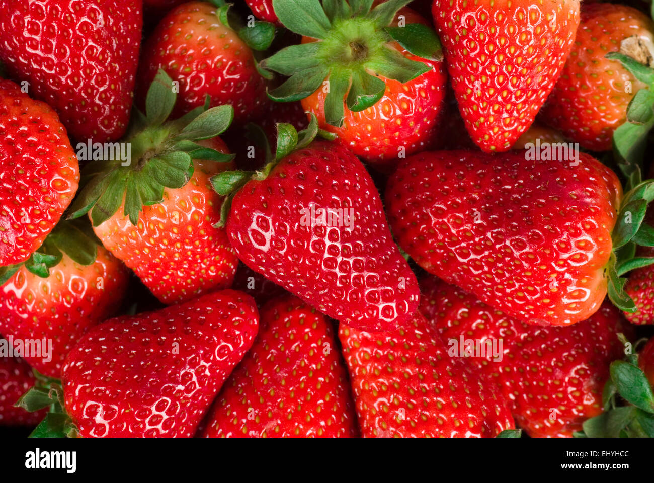 Ripe strawberry background close up full frame Stock Photo - Alamy