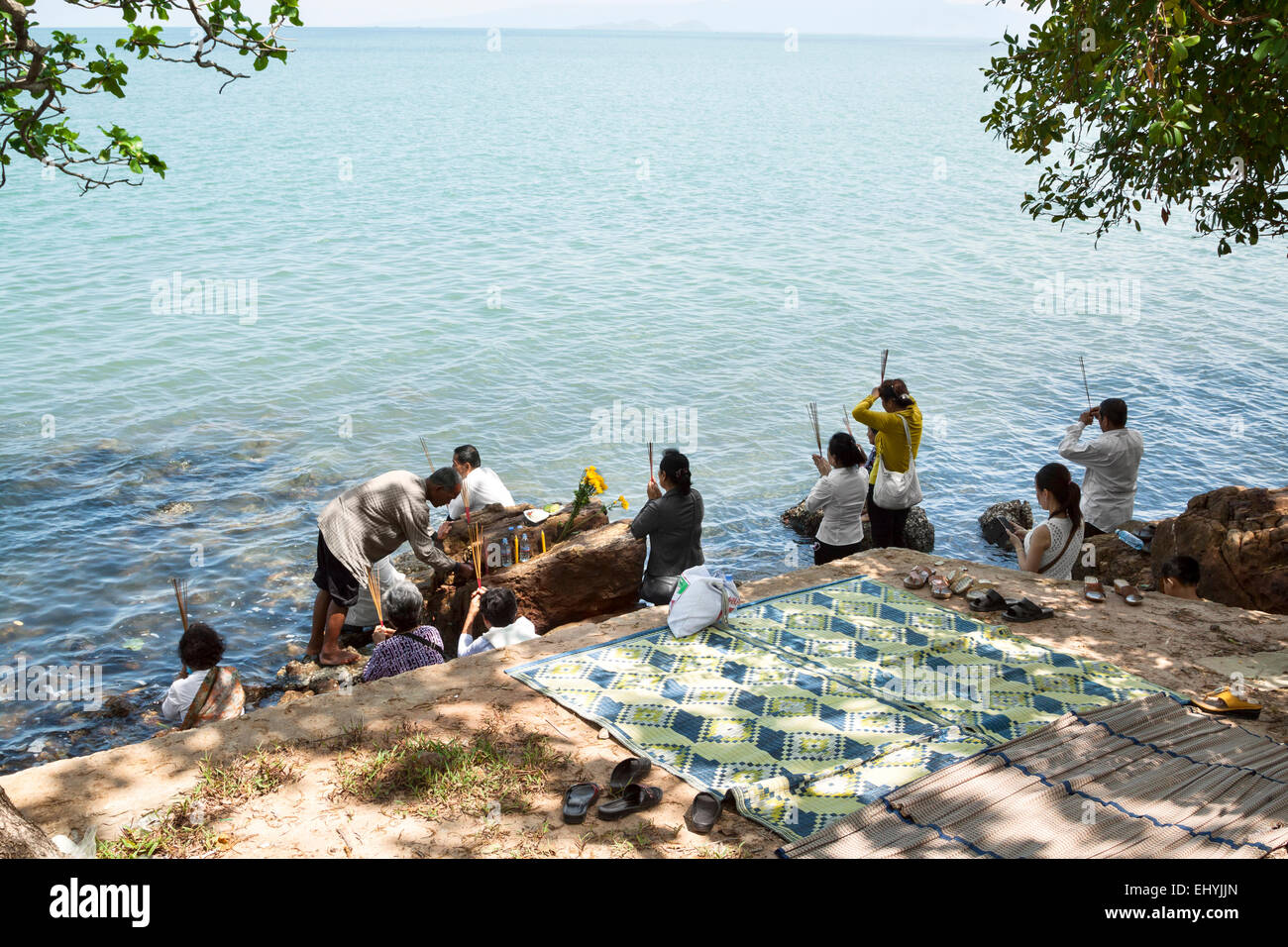 Cambodian family practice spiritual ritual on the seaside in Kep ...