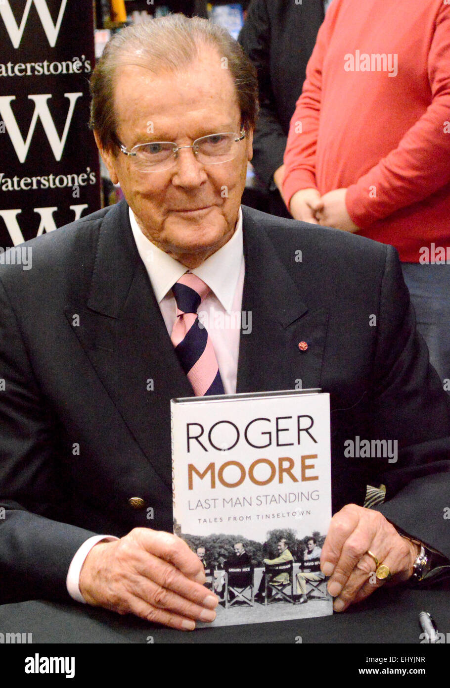 Sir Roger Moore signs copies of his new book 'Last Man Standing: Tales ...
