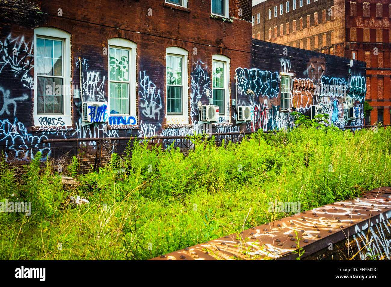 Graffiti on an old brick building, seen from the Reading Viaduct in ...