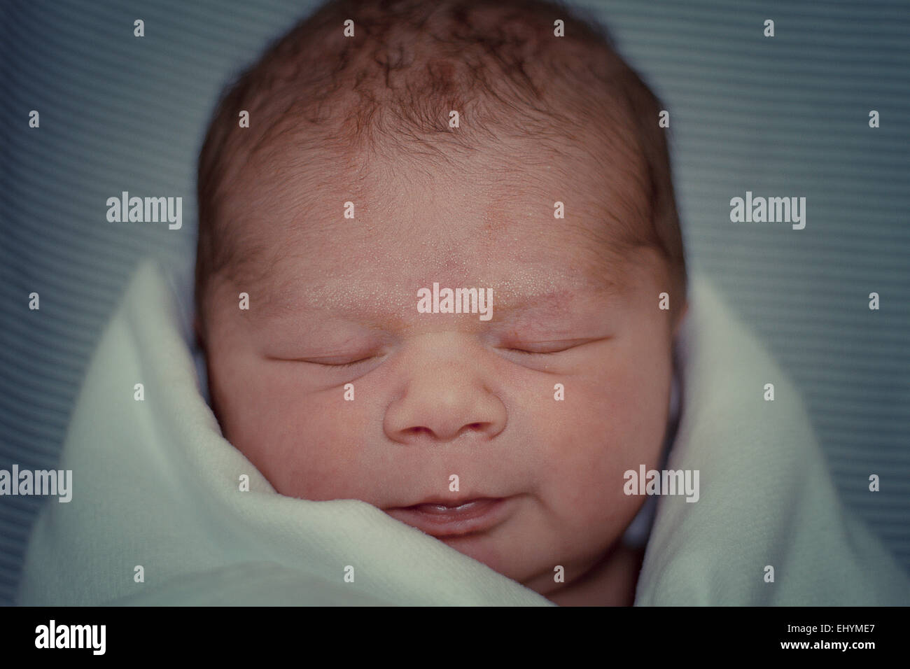 New born baby boy sleeping Stock Photo - Alamy