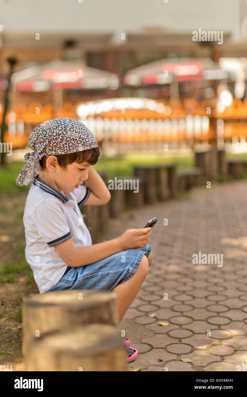 Boy at the park hi-res stock photography and images - Alamy