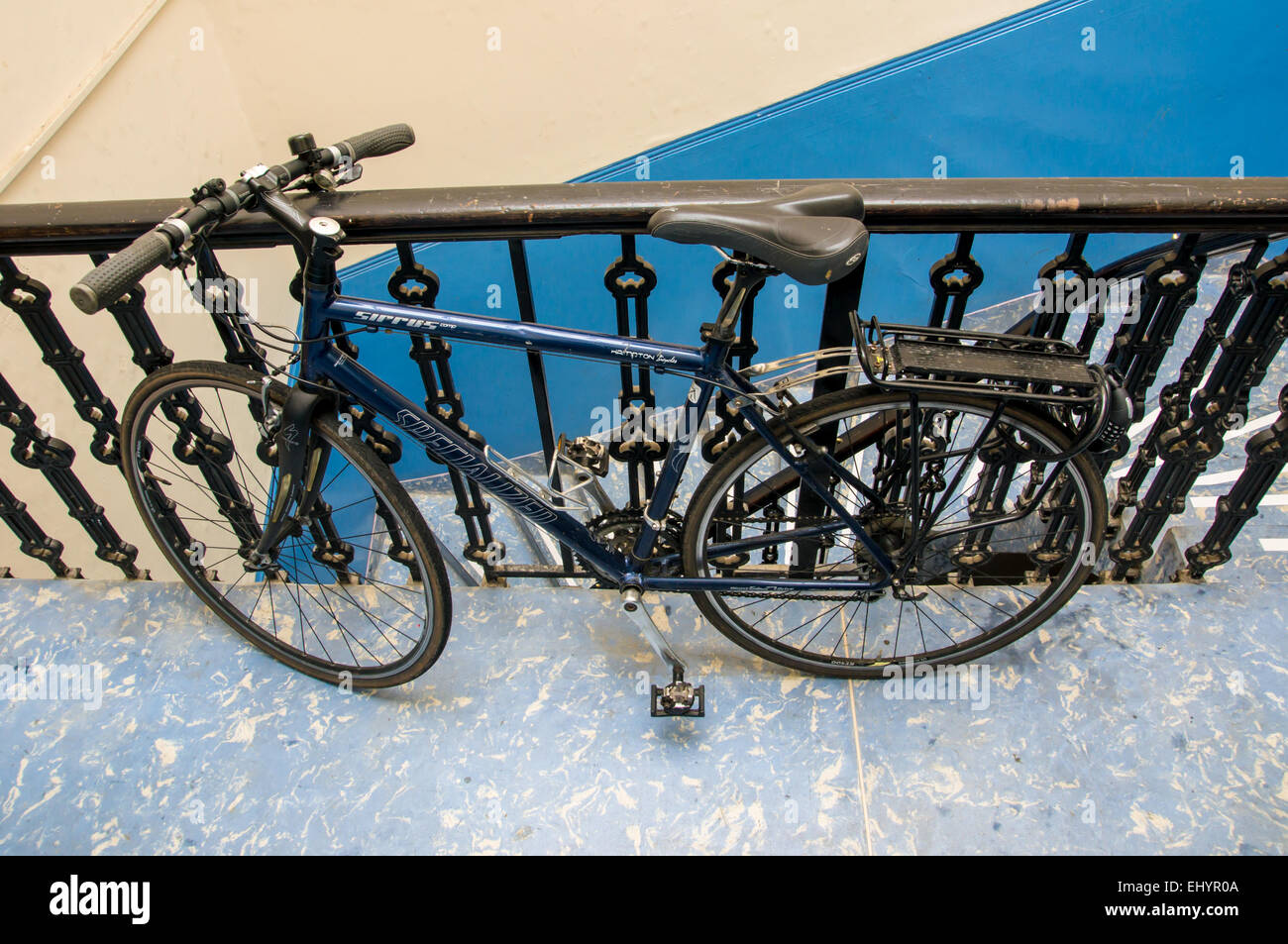 Bike chained to a staircase Stock Photo - Alamy