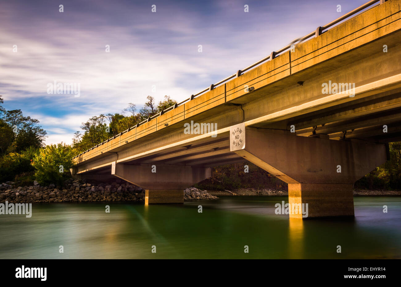 Long exposure of a bridge over Lake Marburg, in Codorus State Park ...