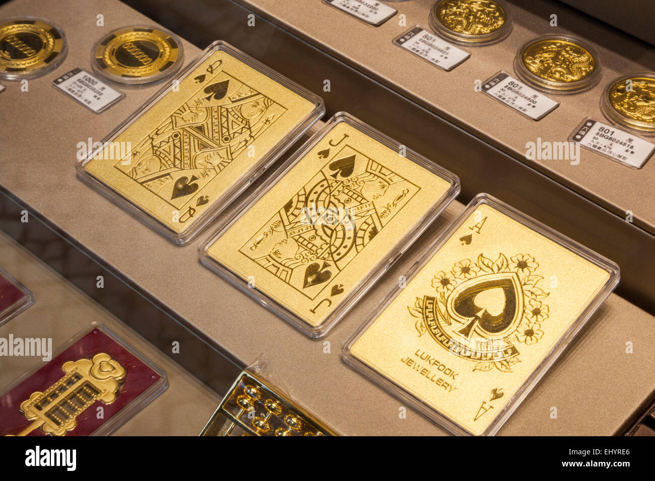 China, Macau, Gold and Jewellery Shop Window, Display of Gold Playing ...