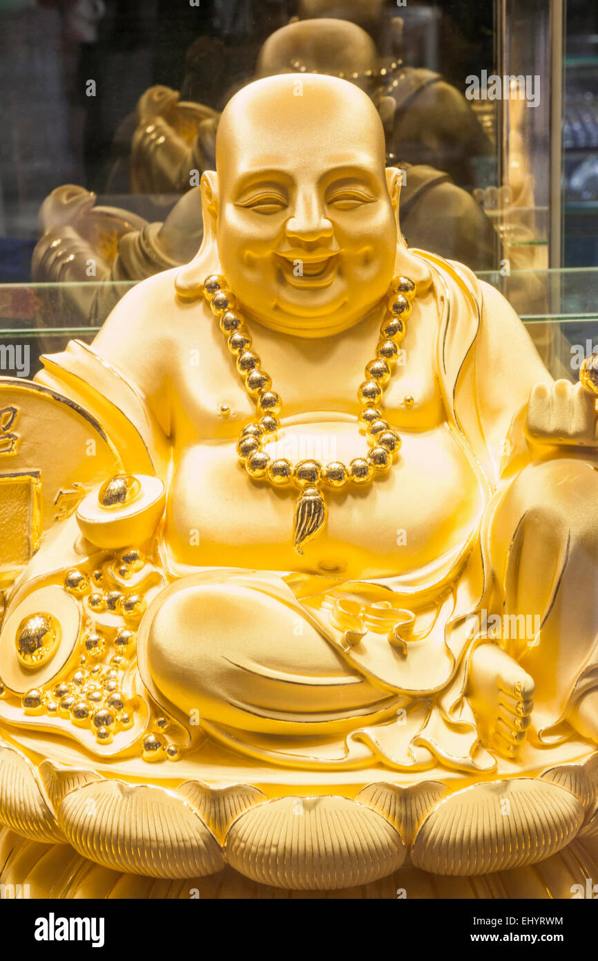 China, Macau, Gold and Jewellery Shop Window, Display of Gold Buddha ...