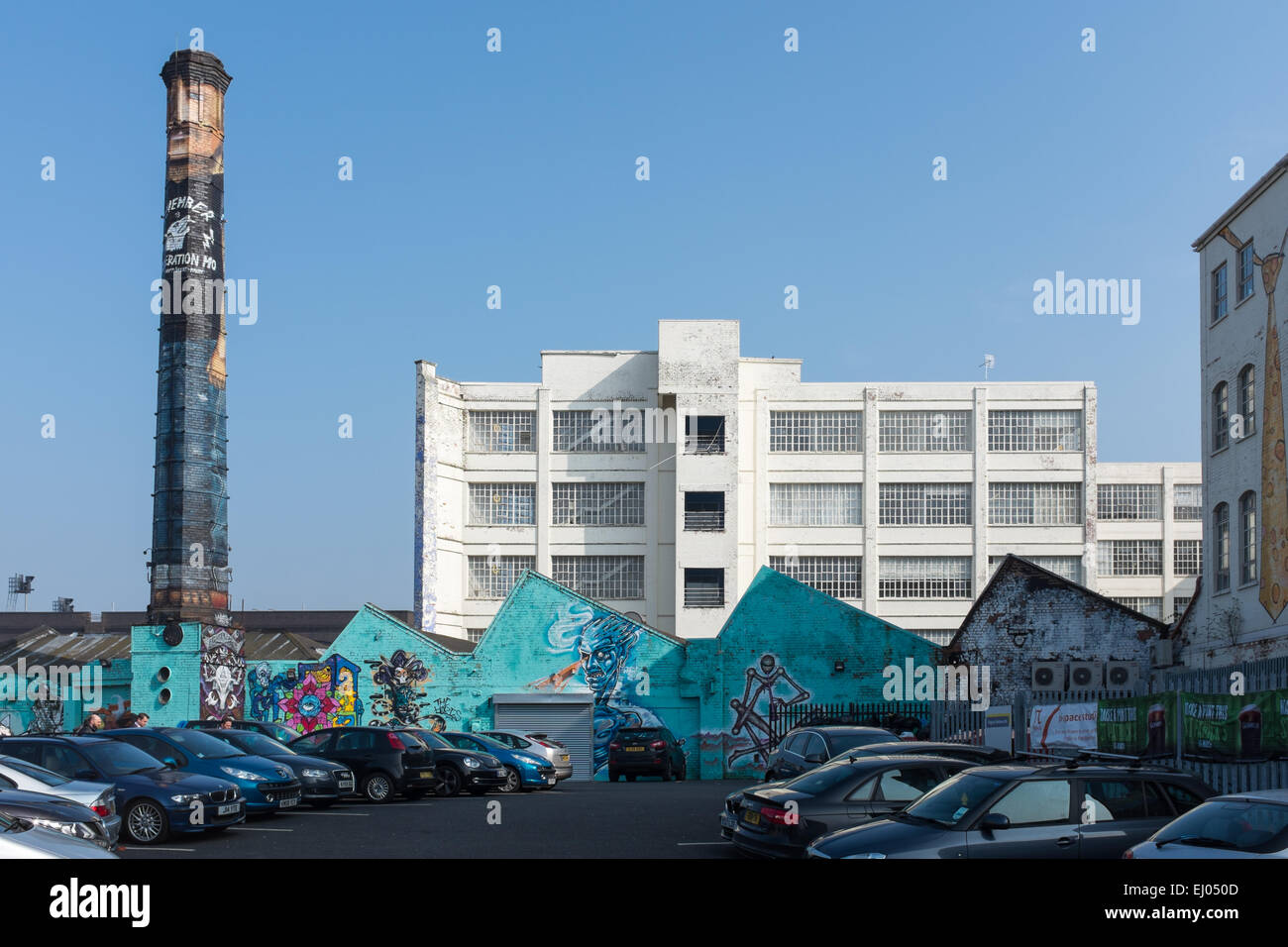 Painted old factory buildings and chimney in the Custard Factory ...