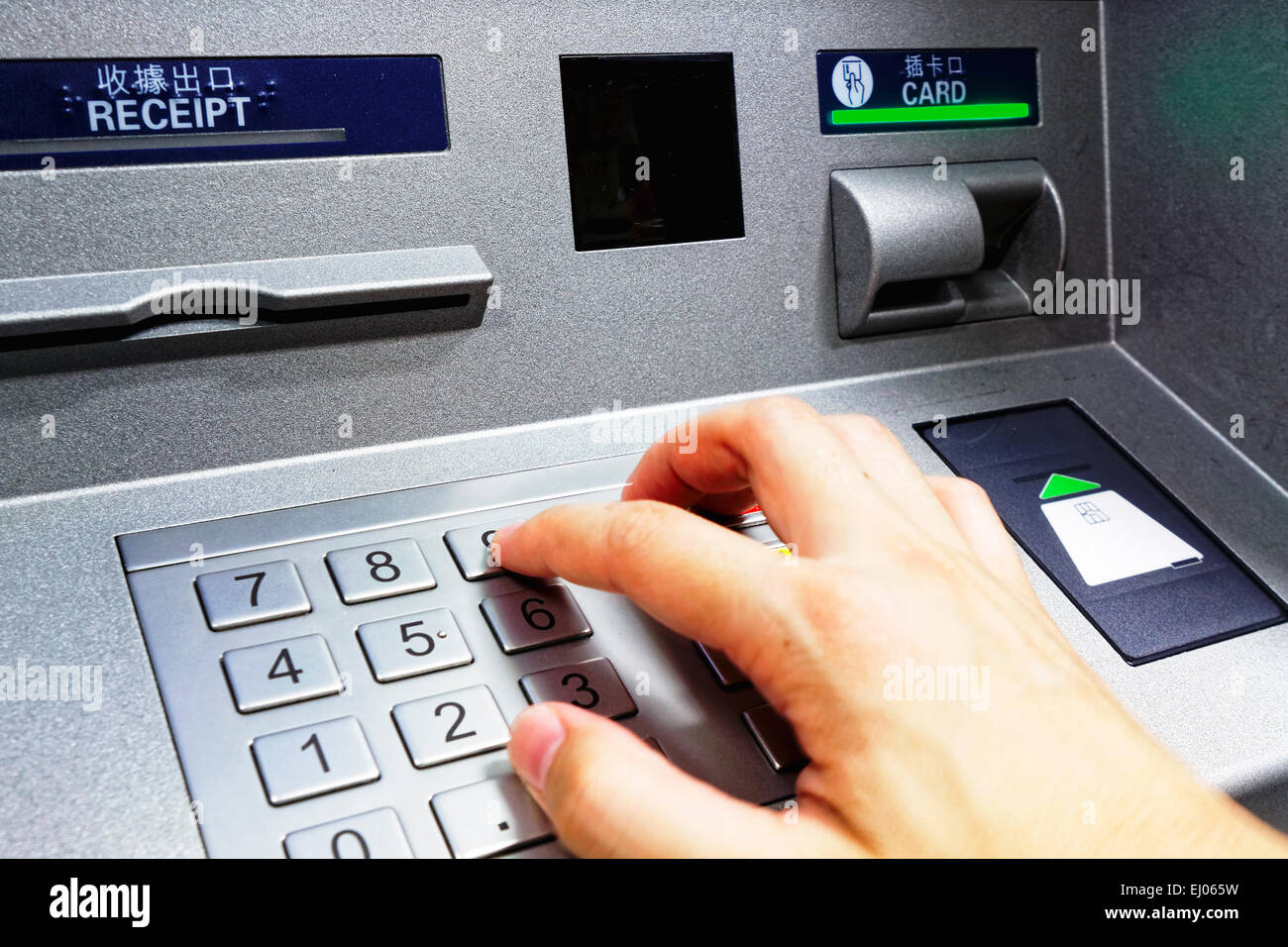 ATM - entering pin close up Stock Photo - Alamy