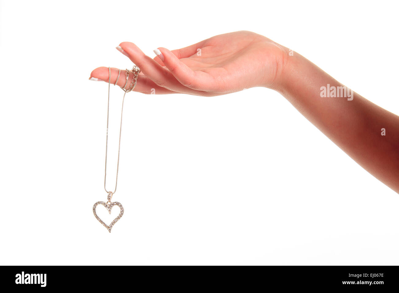 Hand holding heart isolated on white background Stock Photo - Alamy