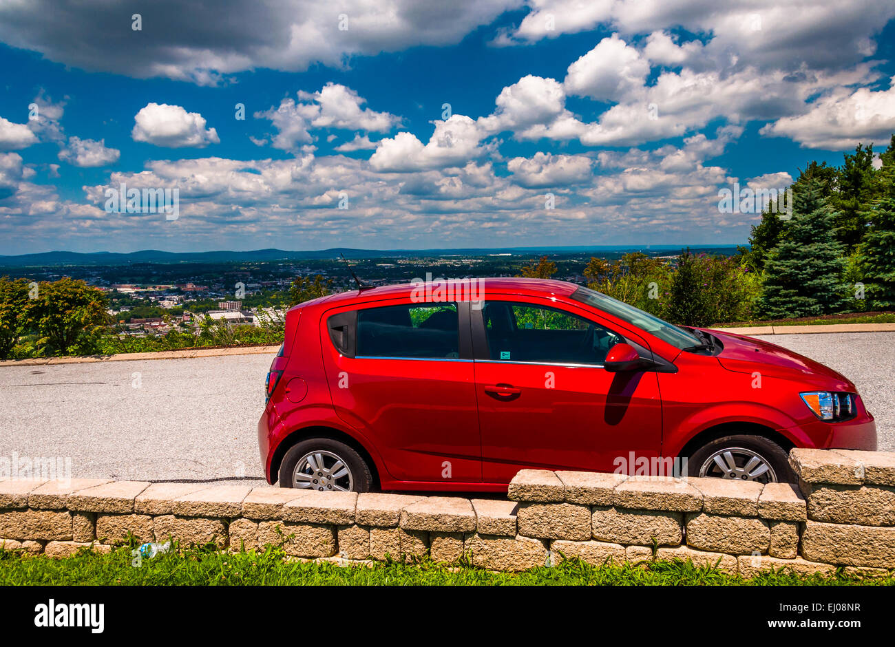 Small red hatchback and view of York, Pennsylvania Stock Photo - Alamy