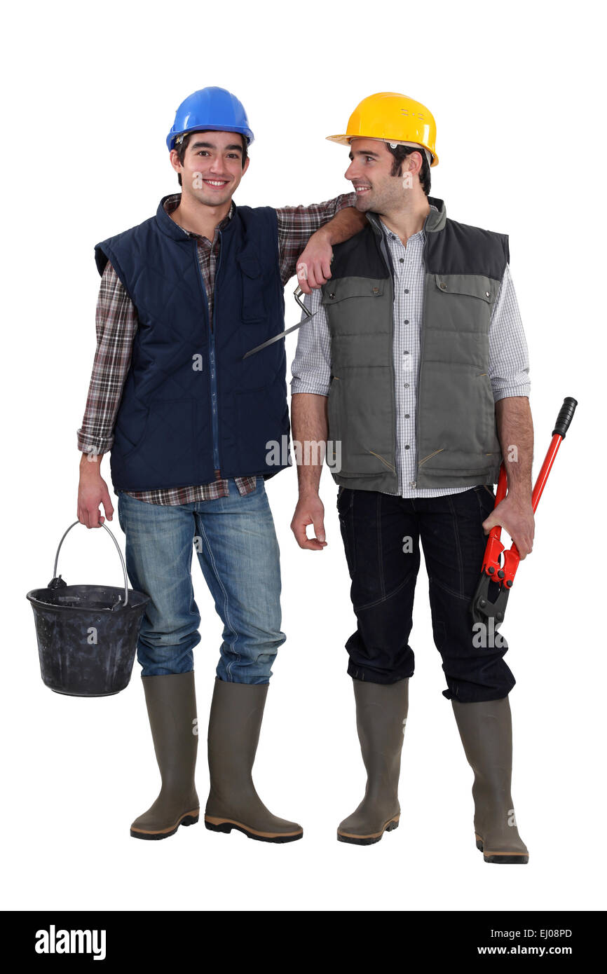 Two construction workers stood together Stock Photo - Alamy