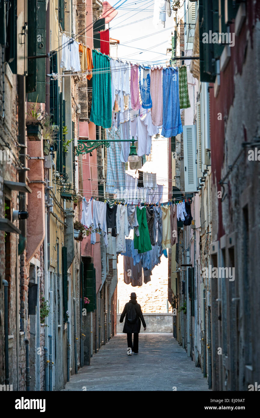 Laundry on clothesline in a narrow street in Castello district Stock ...