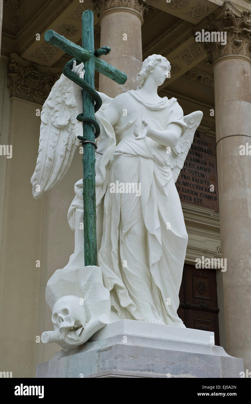 Statue holding a cross hi-res stock photography and images - Alamy