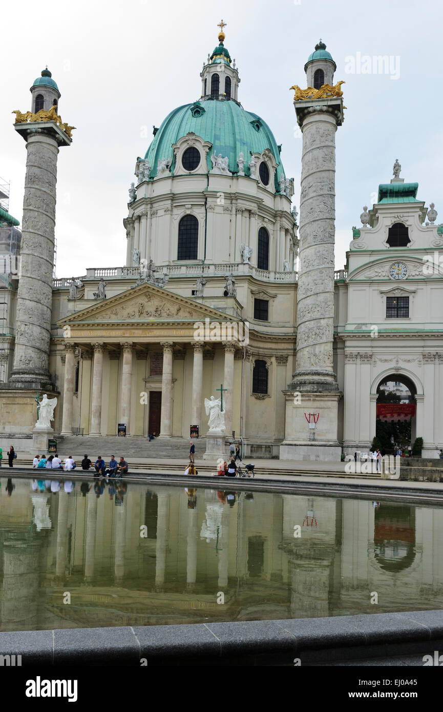 The exterior of Karlskirche (St Charles) church with two tall stone ...