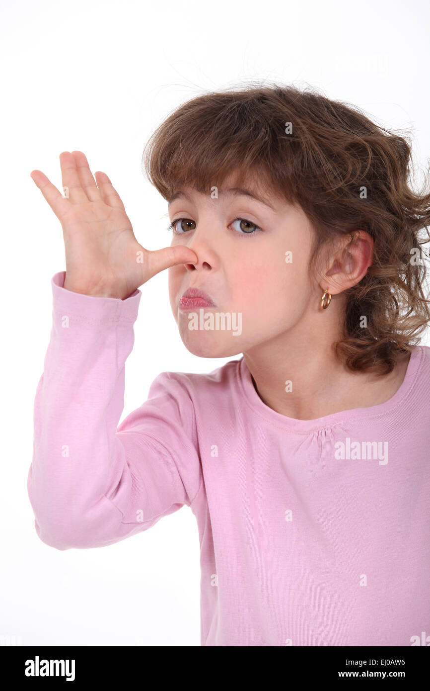 Girl pulling a silly face Stock Photo - Alamy