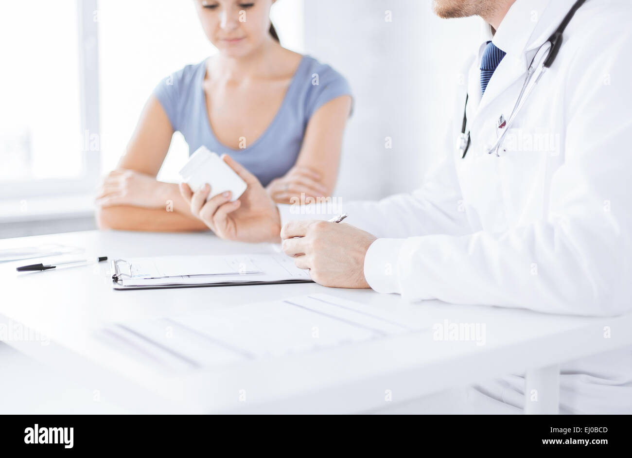 Female doctor prescribing medication patient hi-res stock photography ...