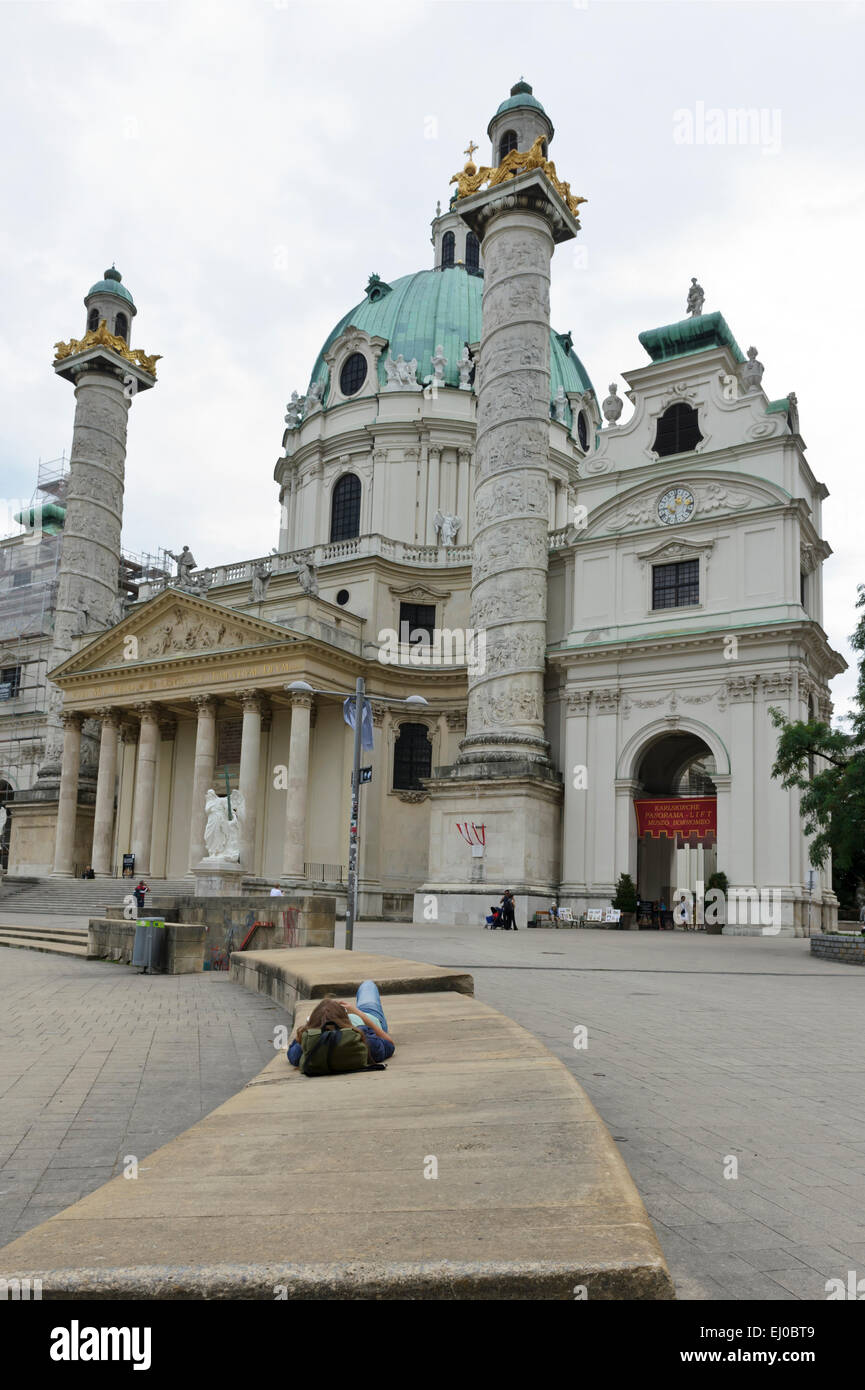 The exterior of Karlskirche (St Charles) church with two tall stone ...