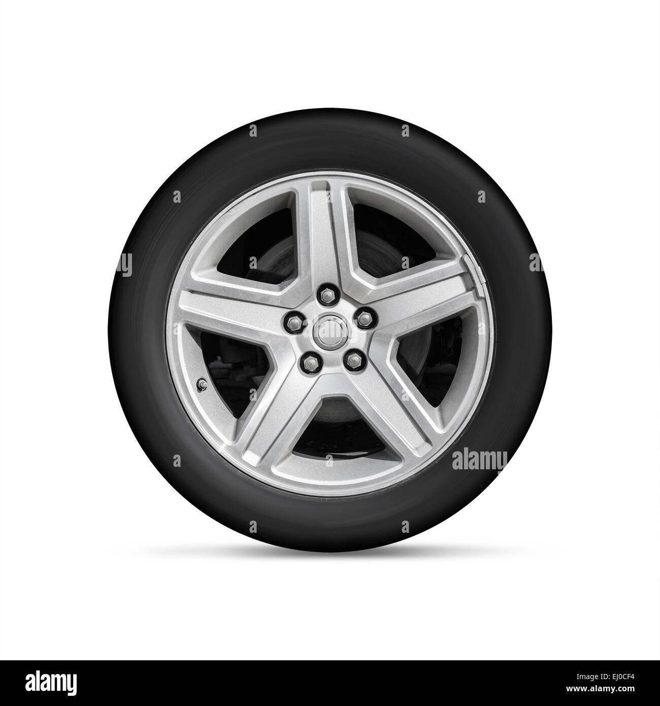Automotive wheel on light alloy disc isolated on white background with ...