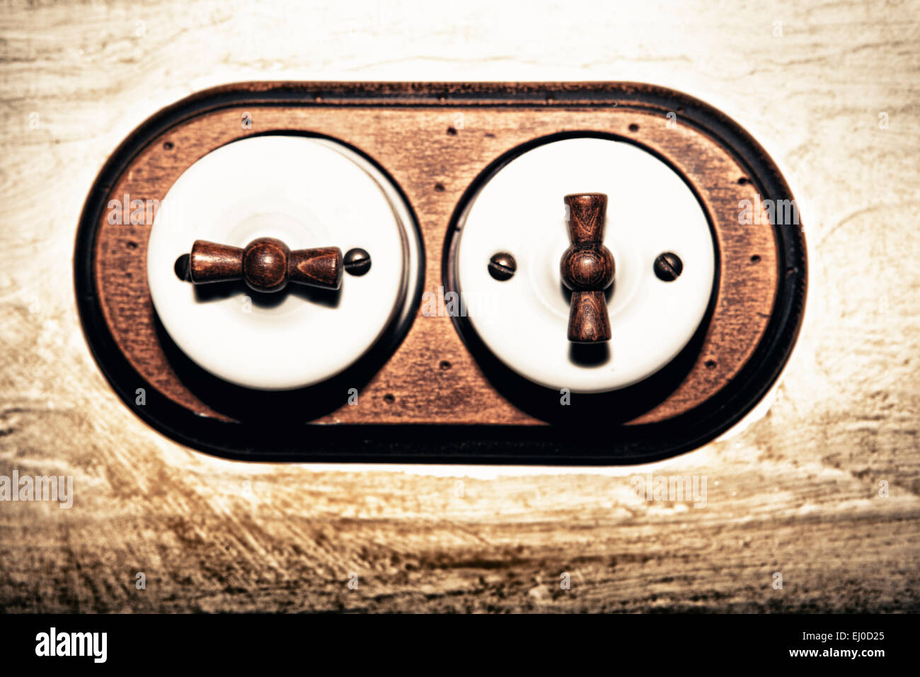 Ancient style double light switch made of porcelain and wood Stock ...