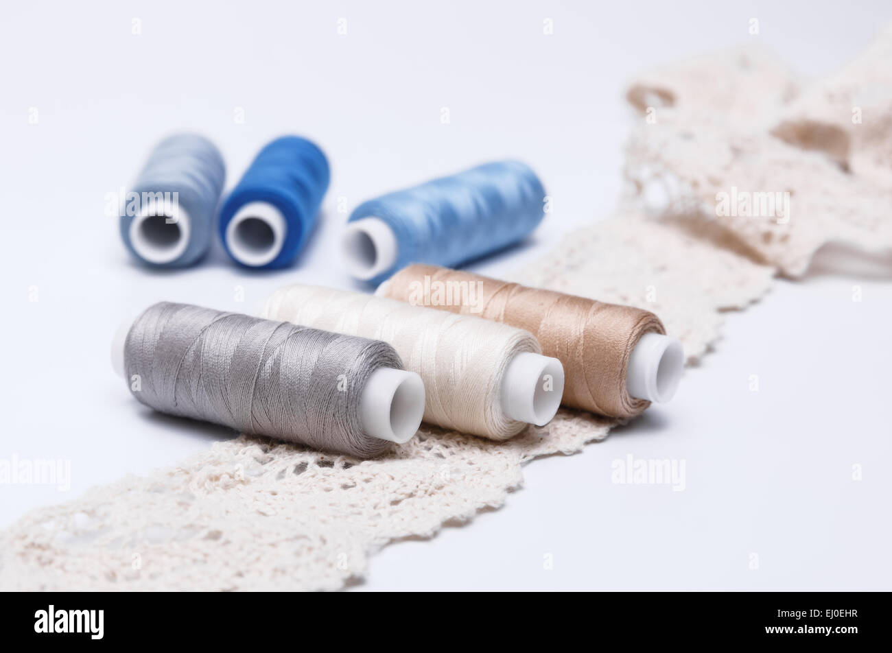 coils with threads Stock Photo - Alamy